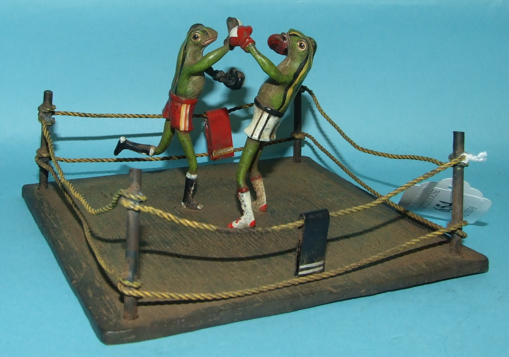 A painted group, of two boxing frogs, within a ring, 7 cm high