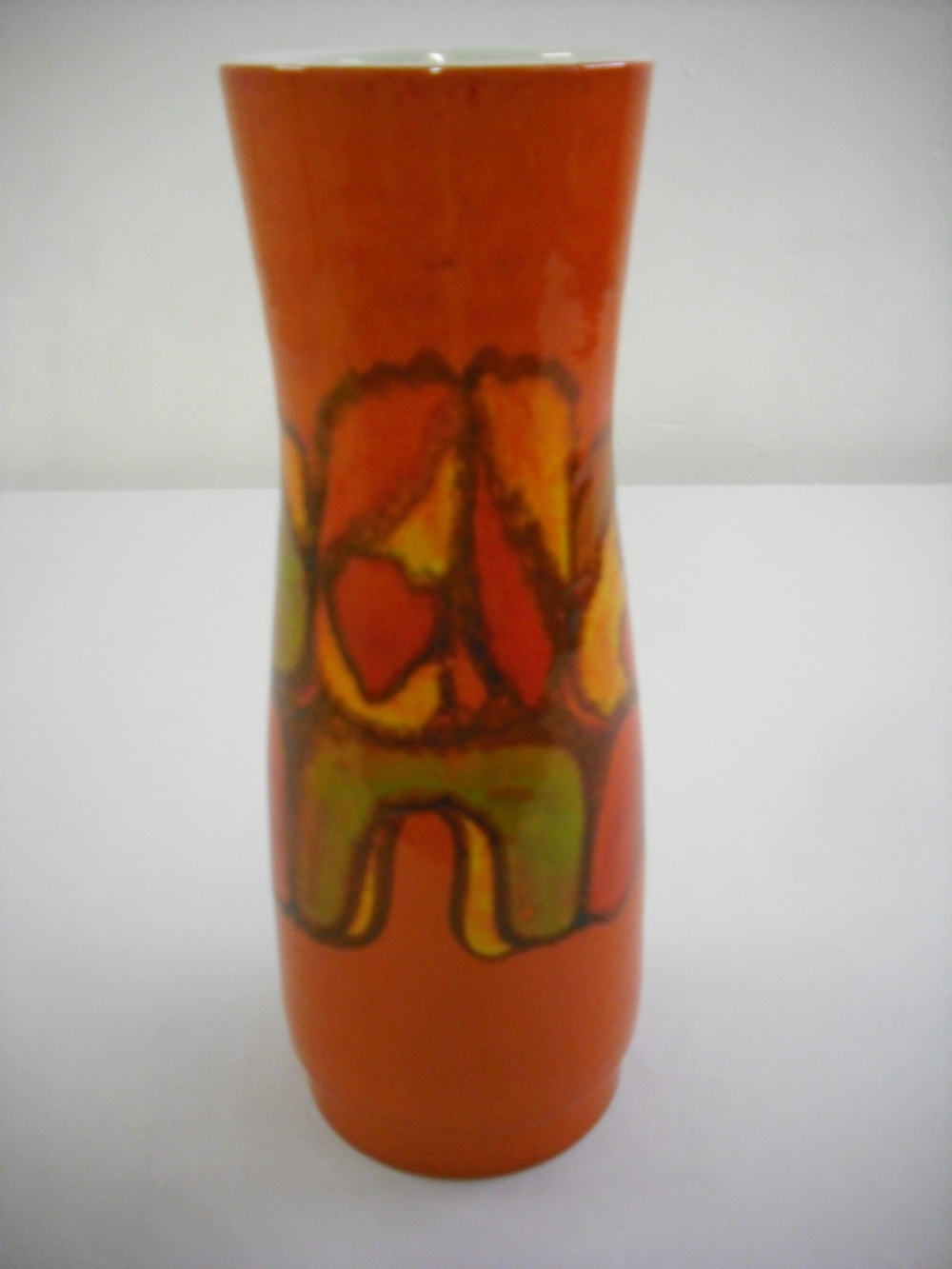 Poole Pottery orange ground vase with contemporary design, marks to the ...