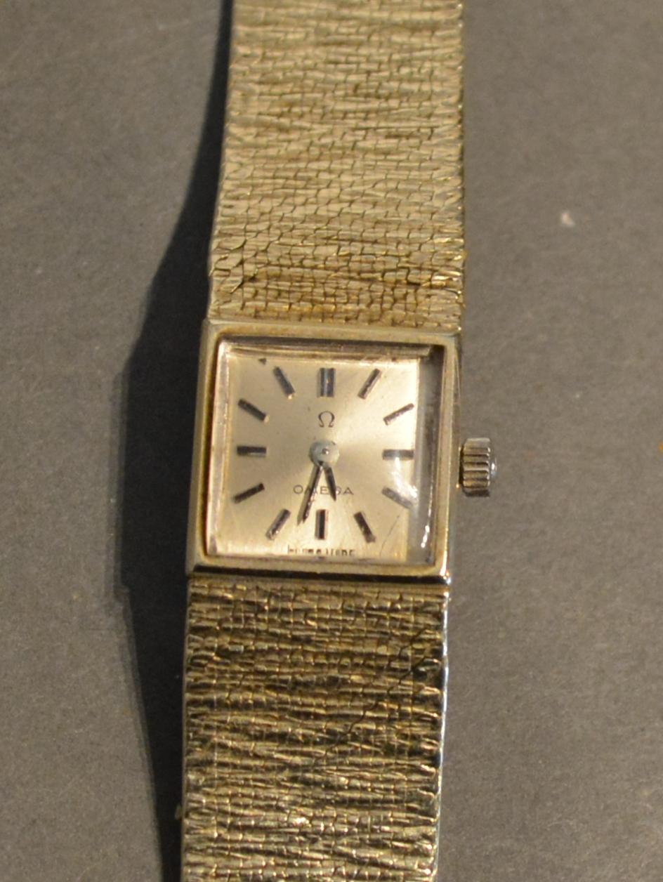 An Omega 9ct. Gold Cased Ladies Wrist Watch With 9ct. Gold Strap, 33.6g ...