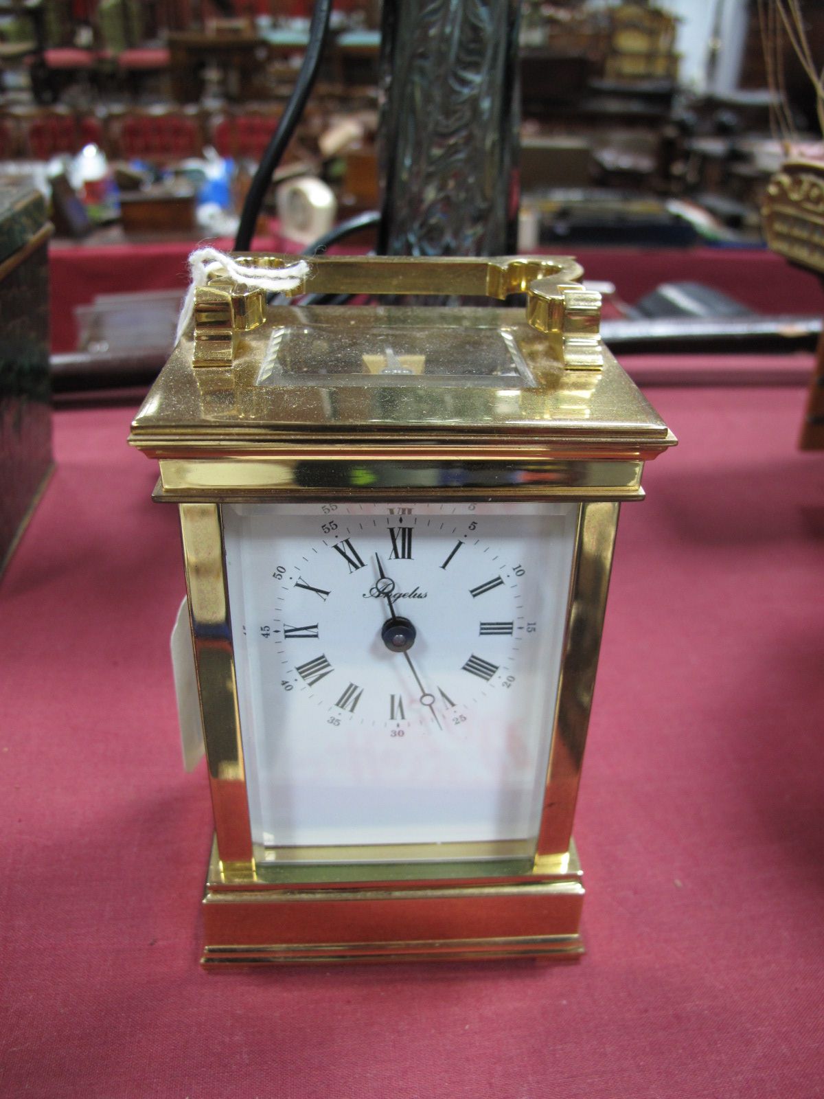 Angelus Carriage Clock, with brass casing.