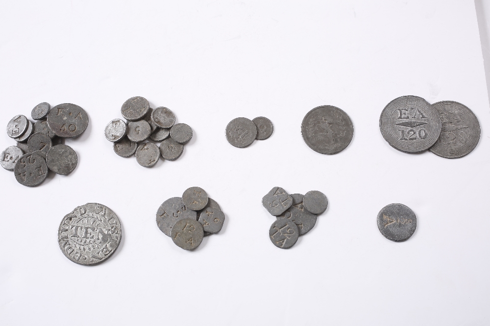 A COLLECTION OF VARIOUS LEAD HOP TOKENS of various denominations from 1 ...