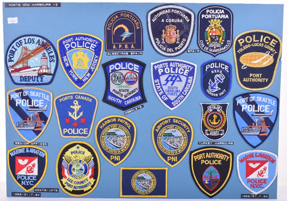 A Large Quantity of Various Worldwide Police Cloth Emblems, including ...