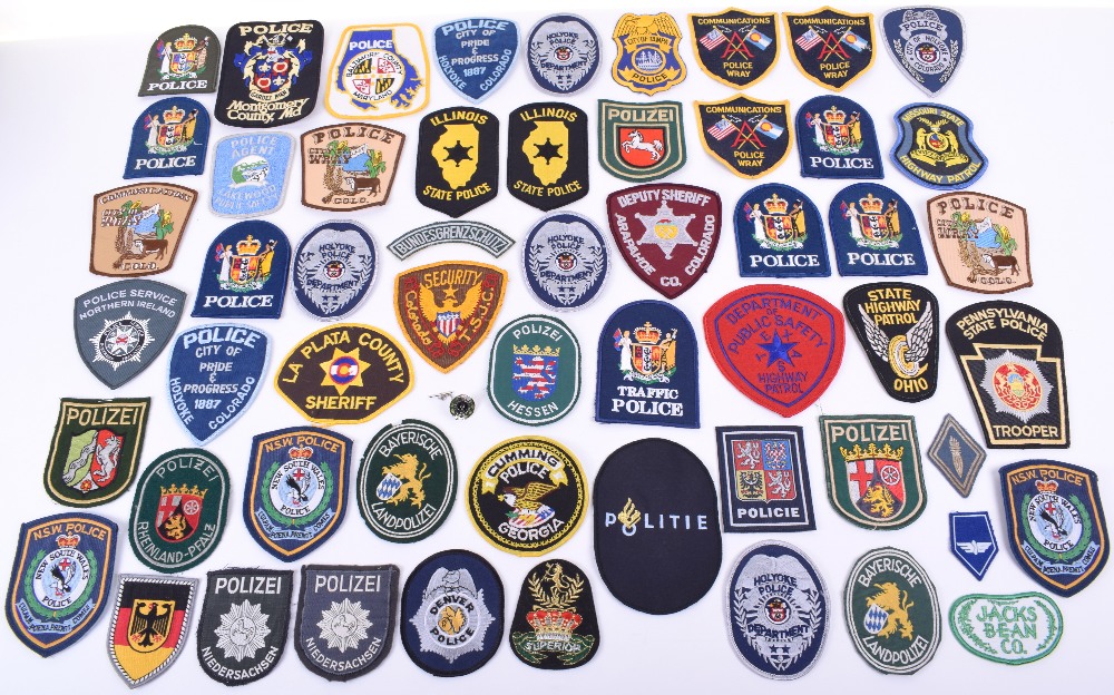 Quantity of Various Worldwide Police Cloth Emblems, including : New ...
