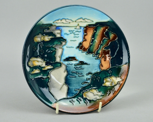 A MOORCROFT POTTERY PLATE, 'Rock of Ages' pattern, impressed backstamp ...