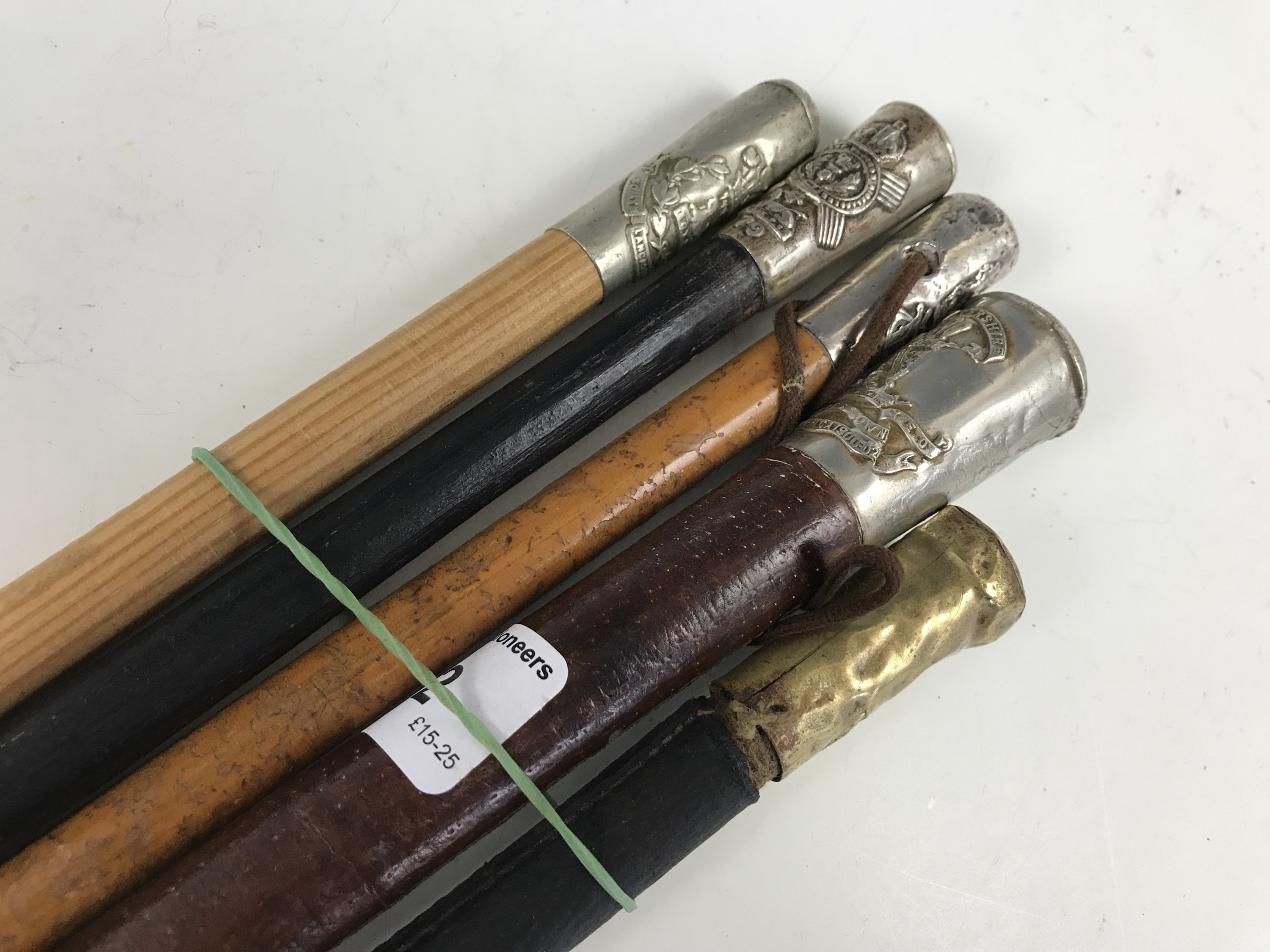 Three British Army swagger sticks, comprising those of the South ...