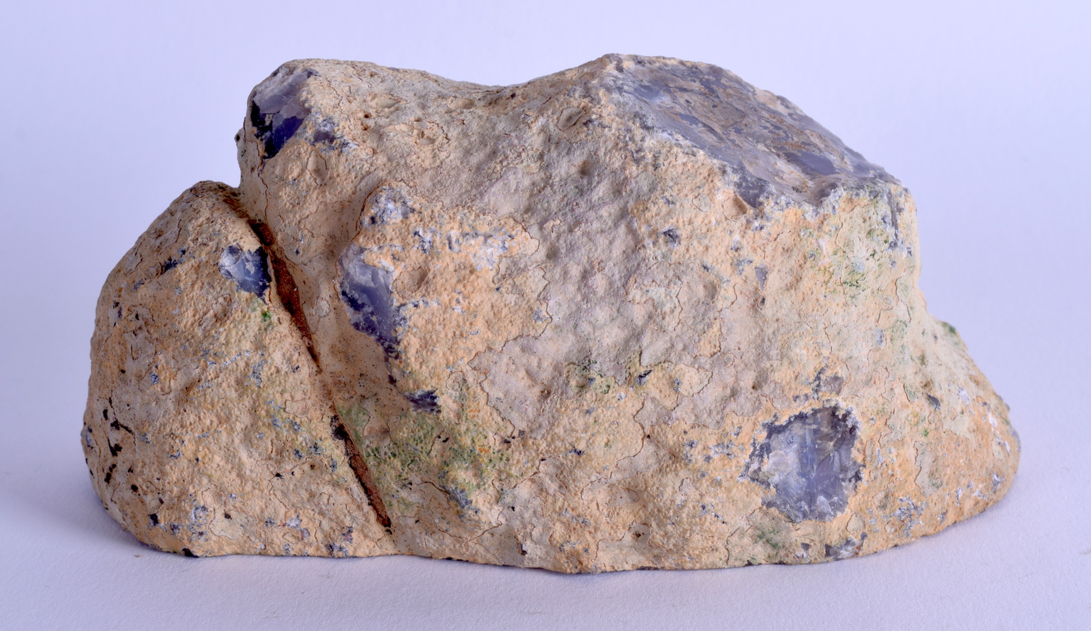 A MIDDLE EASTERN CARVED AGATE BOULDER. 14 cm x 7 cm.