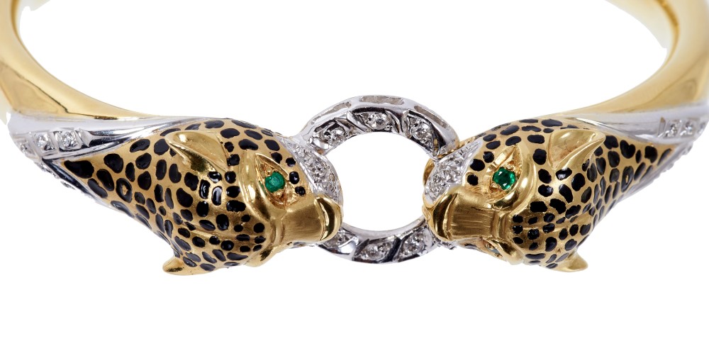 Cartier-style 18ct gold Leopard bangle with a diamond circle clasped by ...