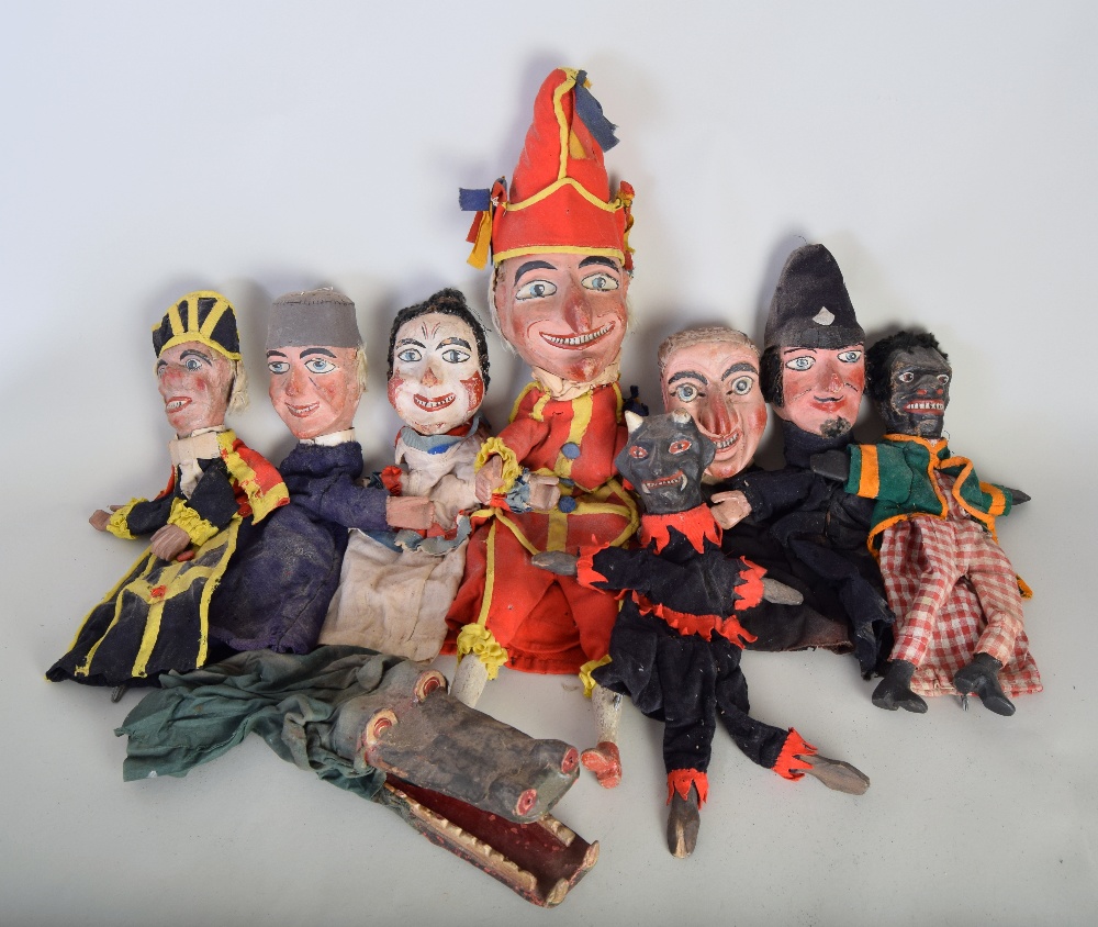 An early 20th century matched part set of Punch and Judy dolls in ...