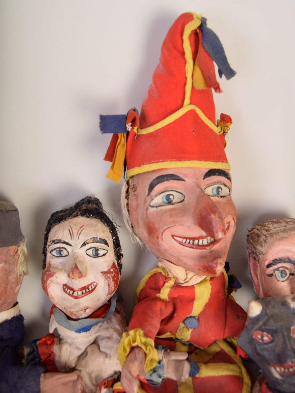 An early 20th century matched part set of Punch and Judy dolls in ...