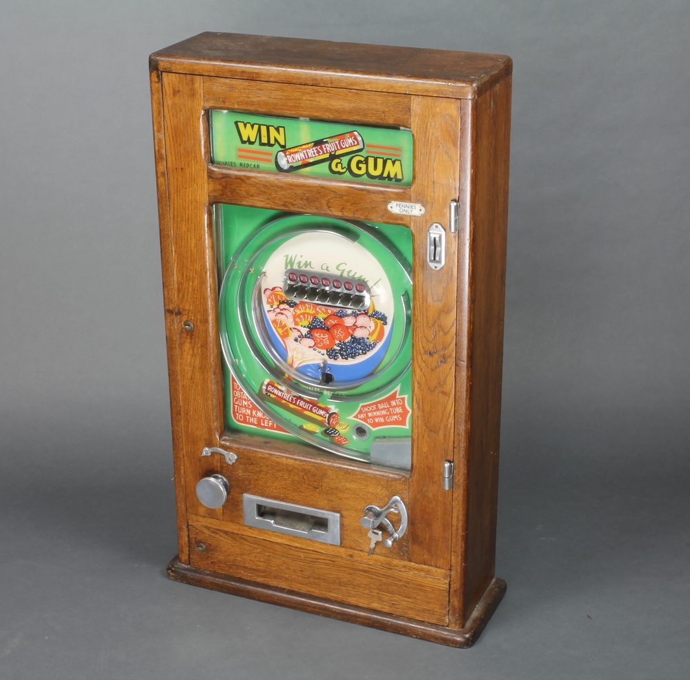 A Rowntree's wall mounted fruit gum dispensing pinball machine ...