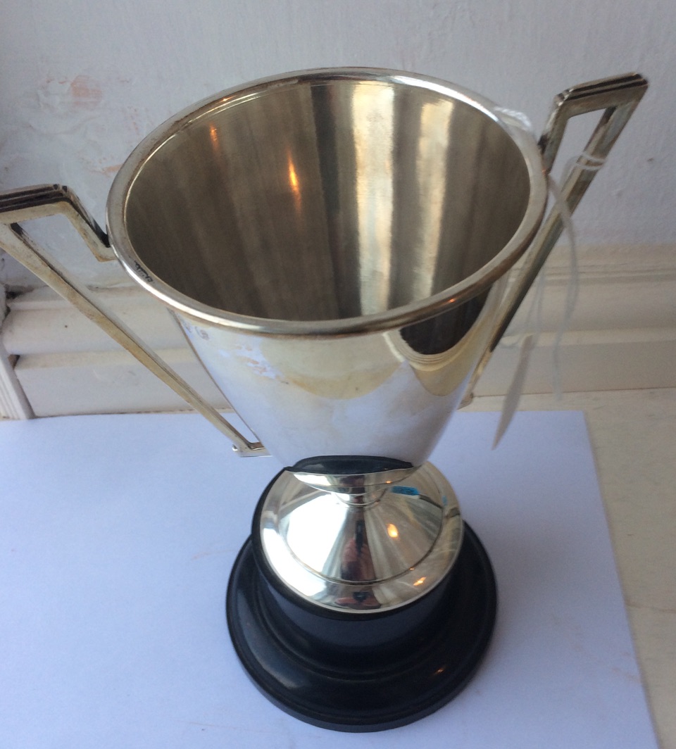 Vintage Silver Trophy on stand.The trophy itself weighs approximately ...