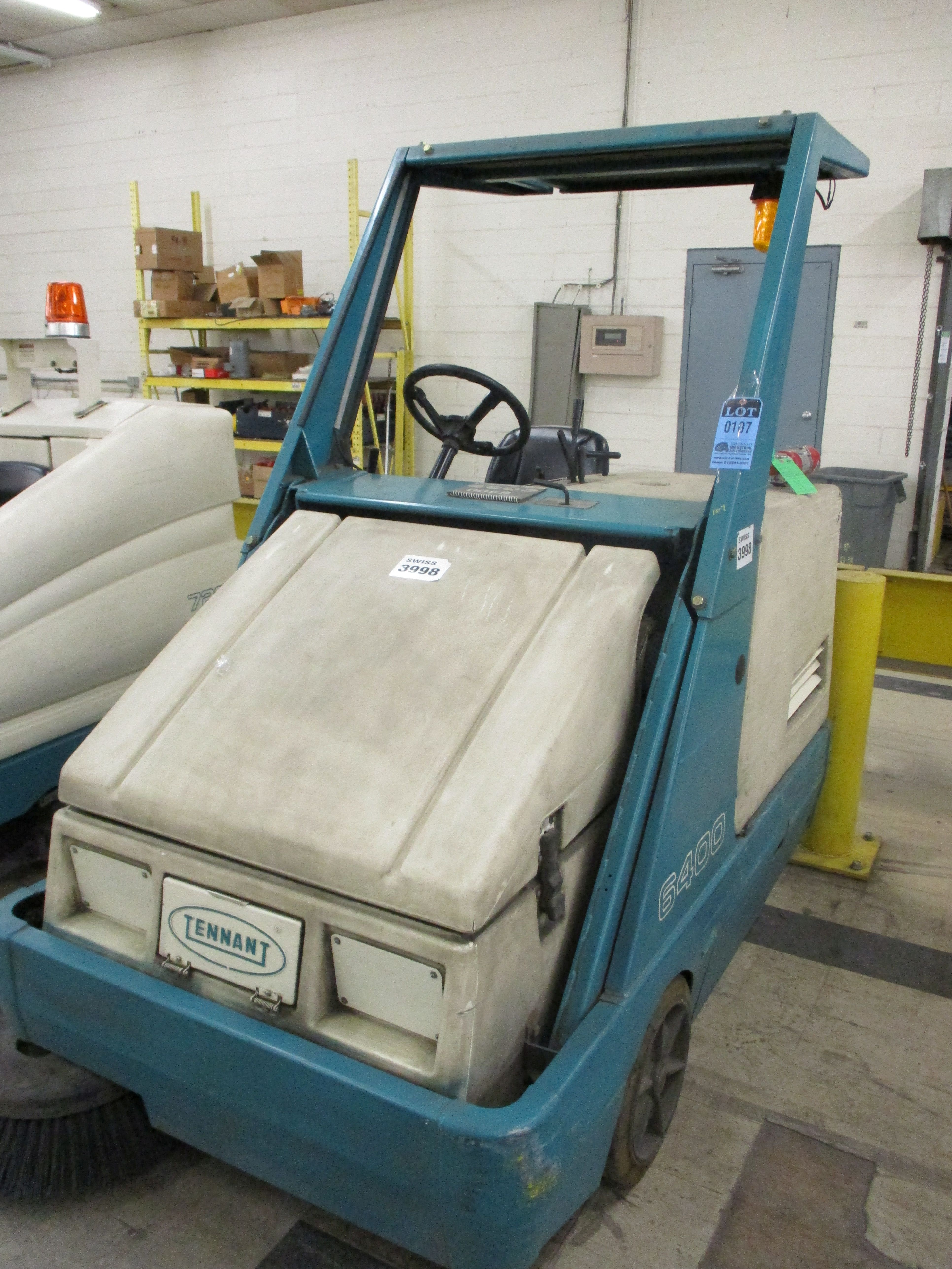TENNANT MODEL 6400 ELECTRIC SIT DOWN TYPE FLOOR SWEEPER; S/N 6400-2059 ...