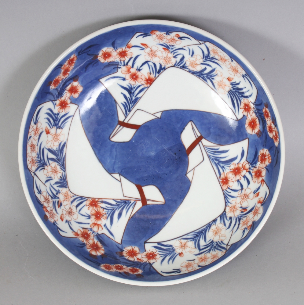 A GOOD 19TH CENTURY JAPANESE NABESHIMA PORCELAIN DISH, supported on a ...
