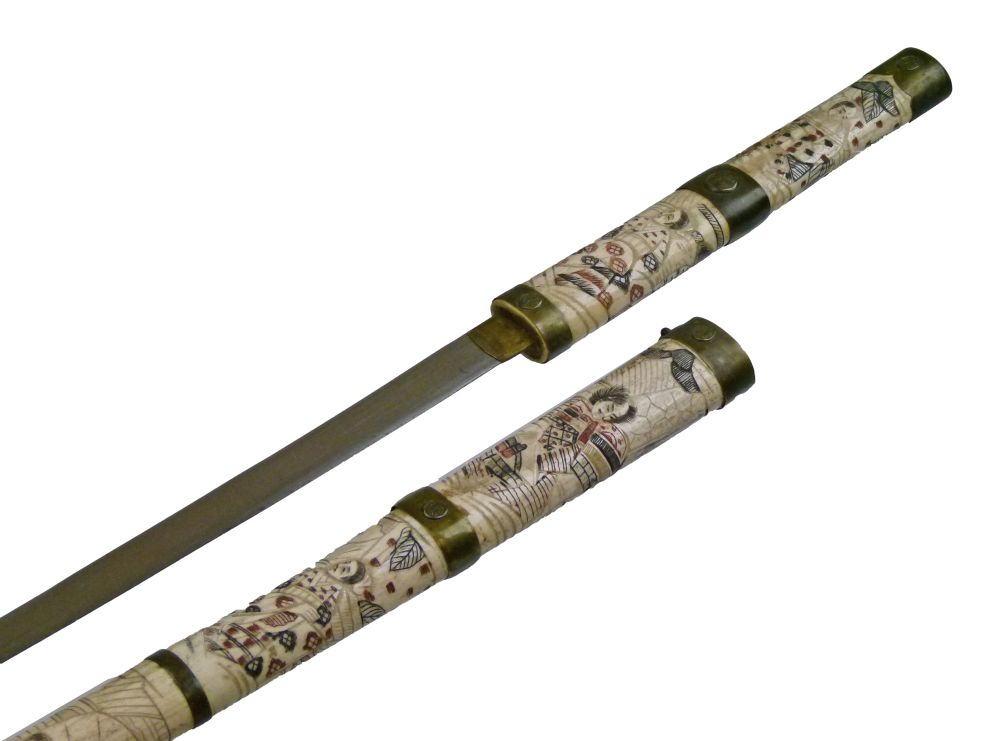 Japanese bone sword, sheath carved in sections with Samurai figures ...