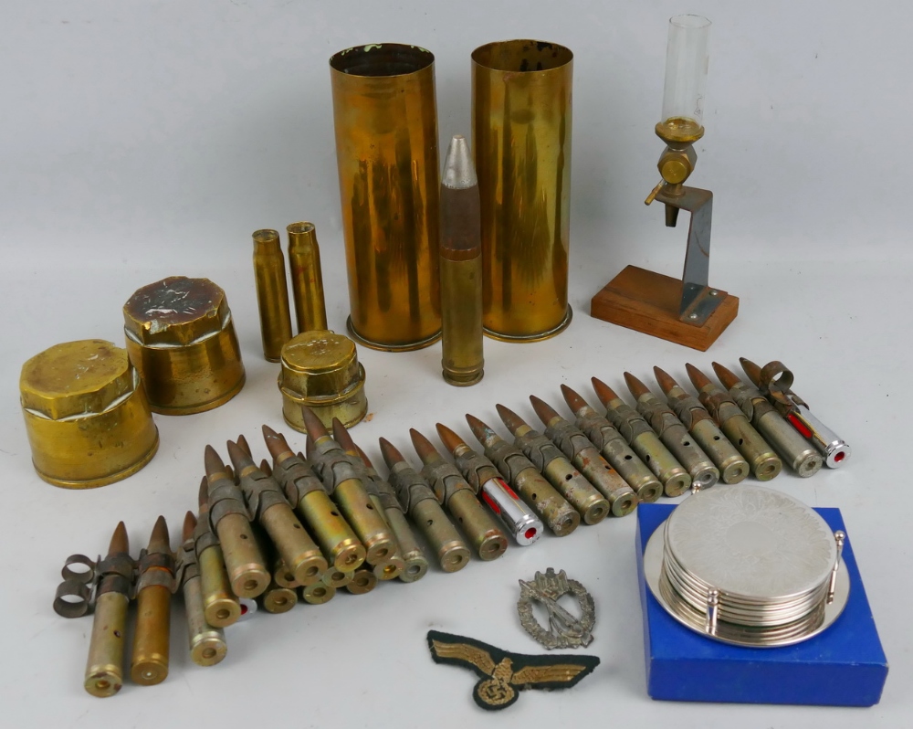 Two WWI brass shell cases, dated 1909 and 1917 23cm high, a brass/glass ...