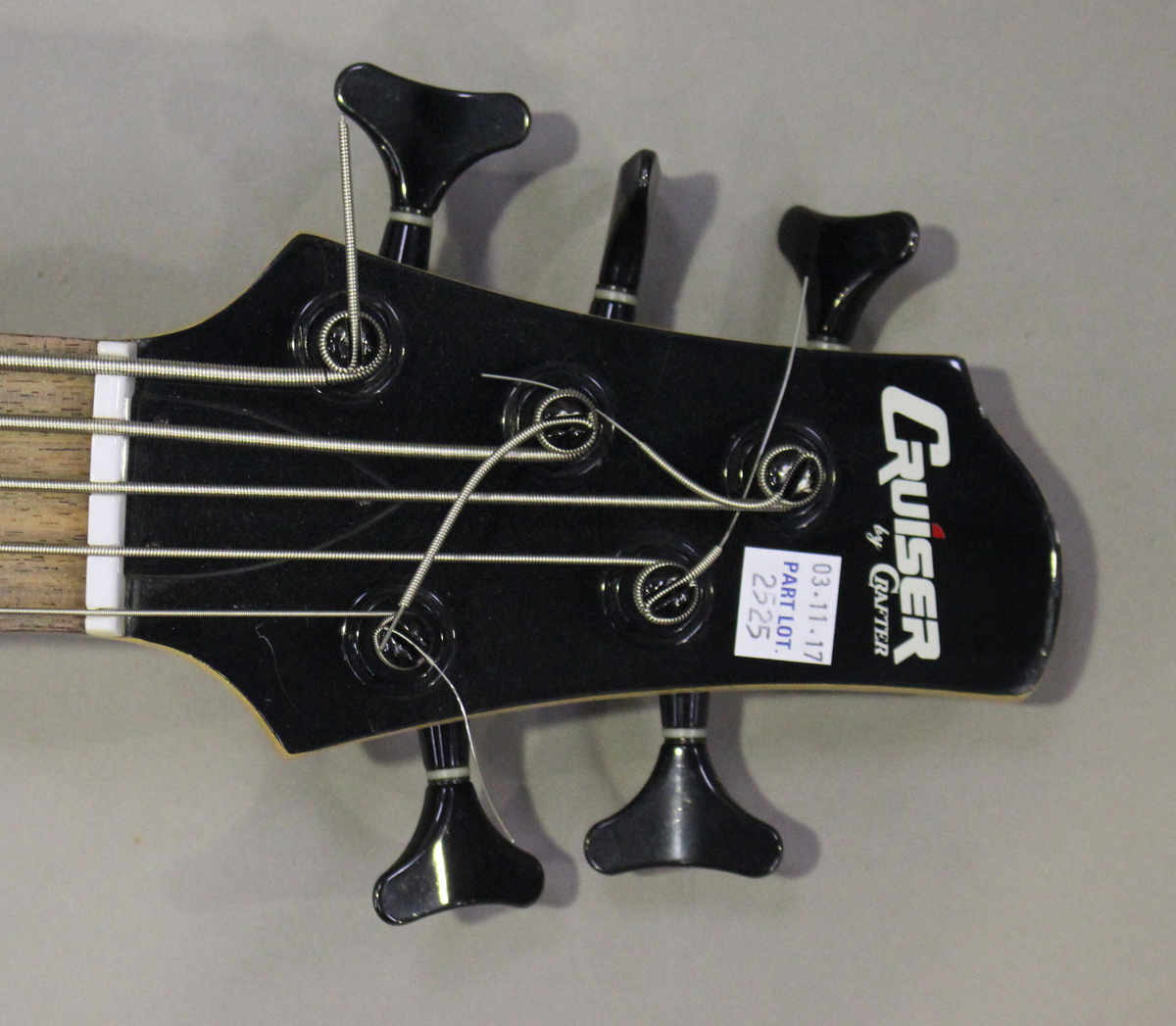 A Crafter Cruiser 5-string bass guitar, finished in metallic black ...