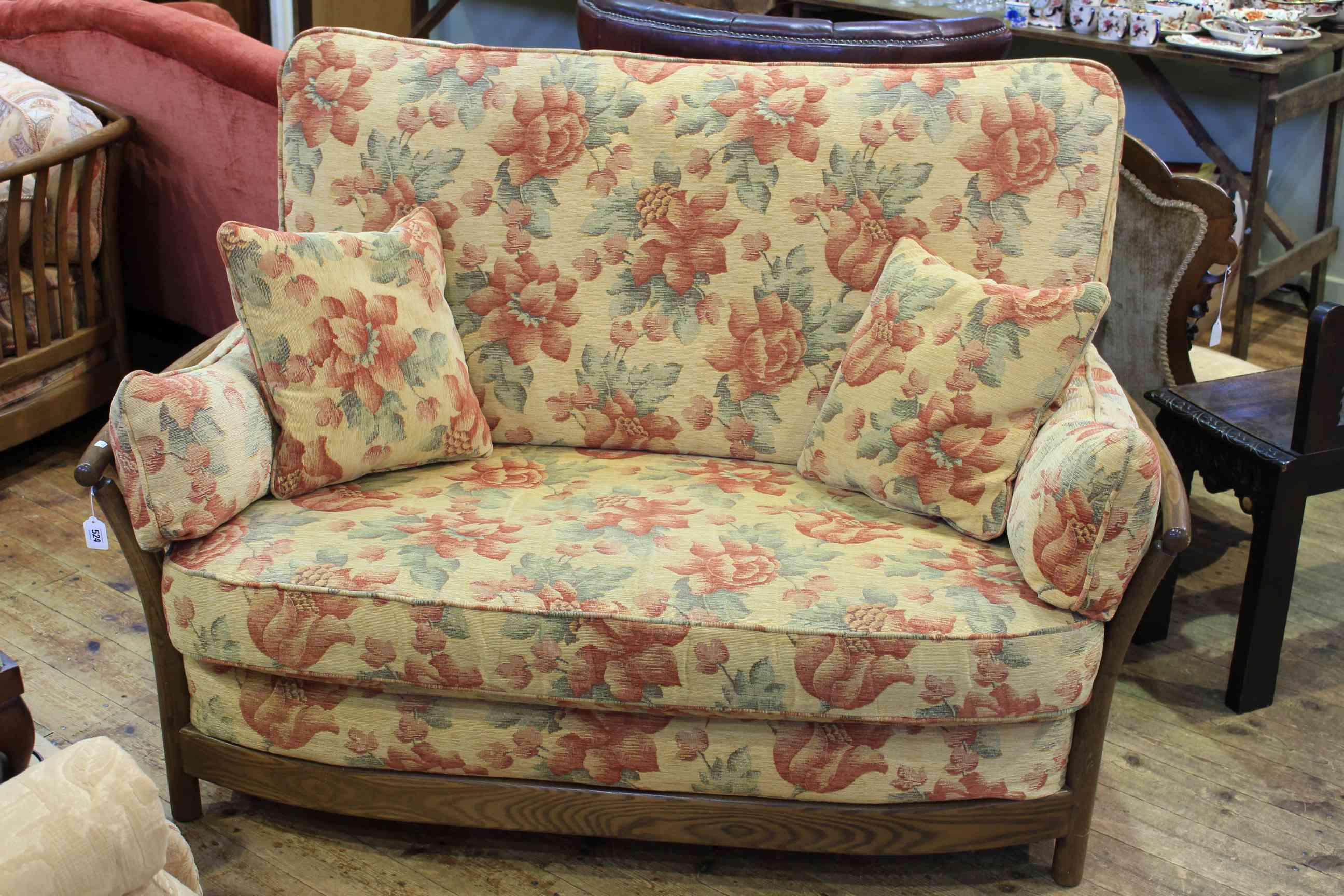 Ercol Renaissance two seater settee in floral pattern fabric