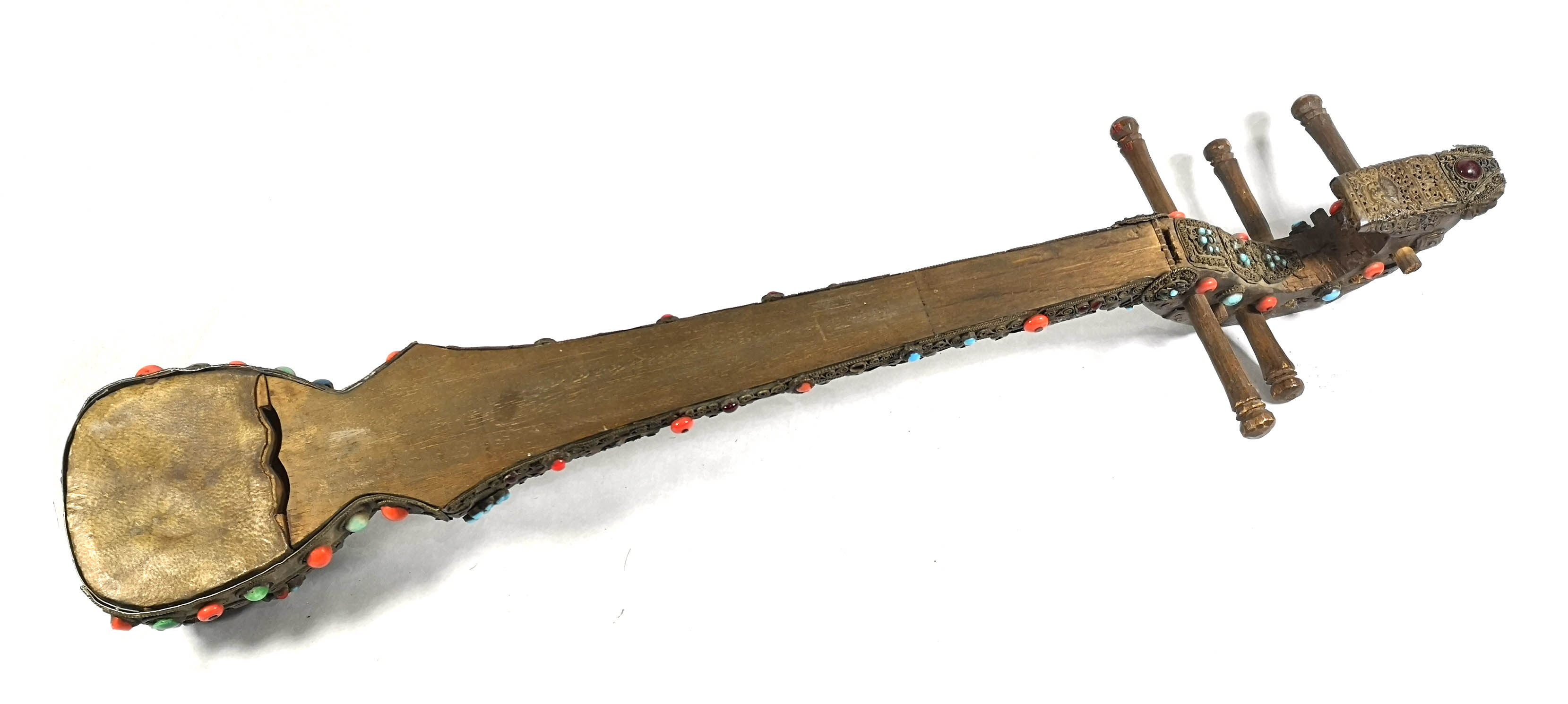 AN EARLY 20TH CENTURY TIBETAN COPPER MOUNTED DRAMYINModelled with ...