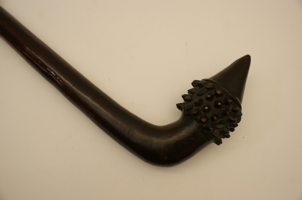 Fijian totokia war club, traditional form with spiked head at right ...