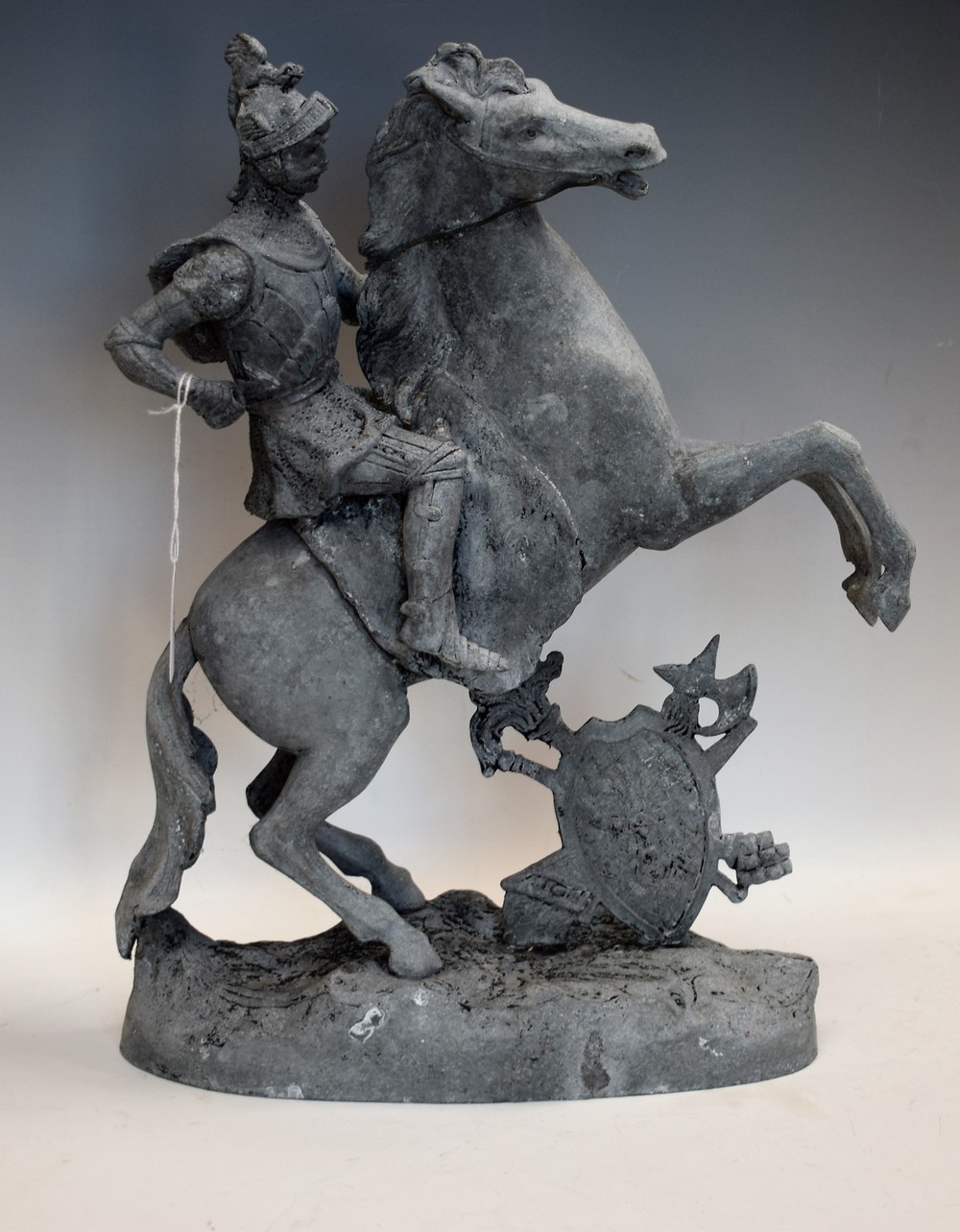 An early 20th century spelter model, Sir George, Knight on a rearing ...
