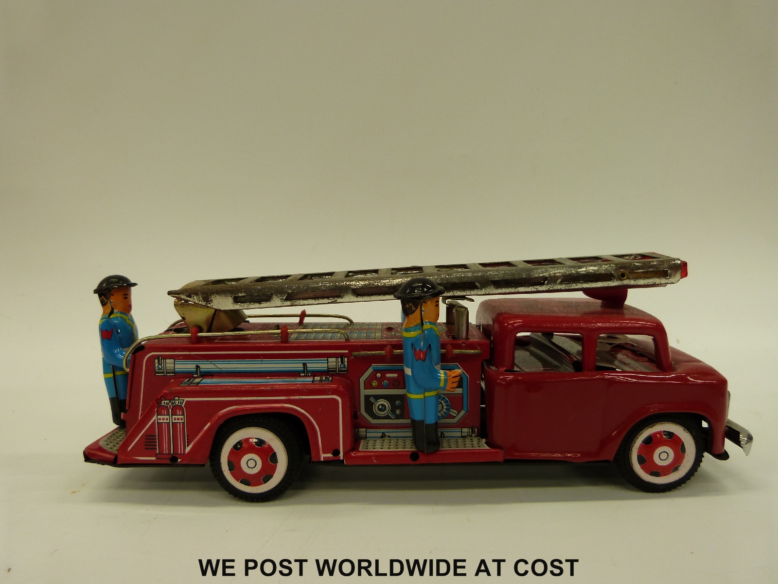 Three tin-plate model fire engines comprising of a Japanese Fire Chief ...
