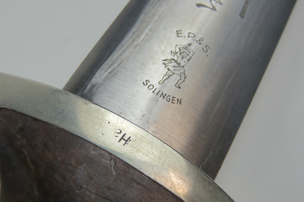 A WWII German SA dagger with full Rhom inscribed blade, having makers ...