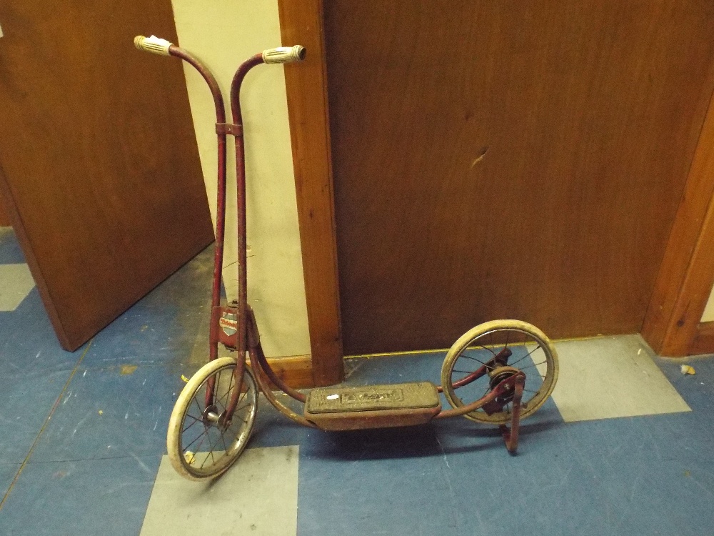 A Vintage Child's Triang Scooter.
