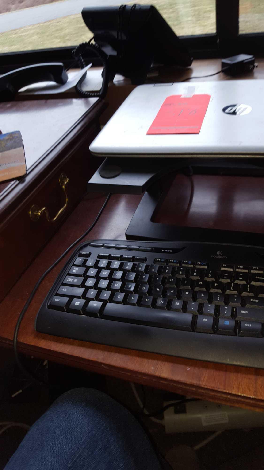 dy laptop computer with added keyboard and mouse.