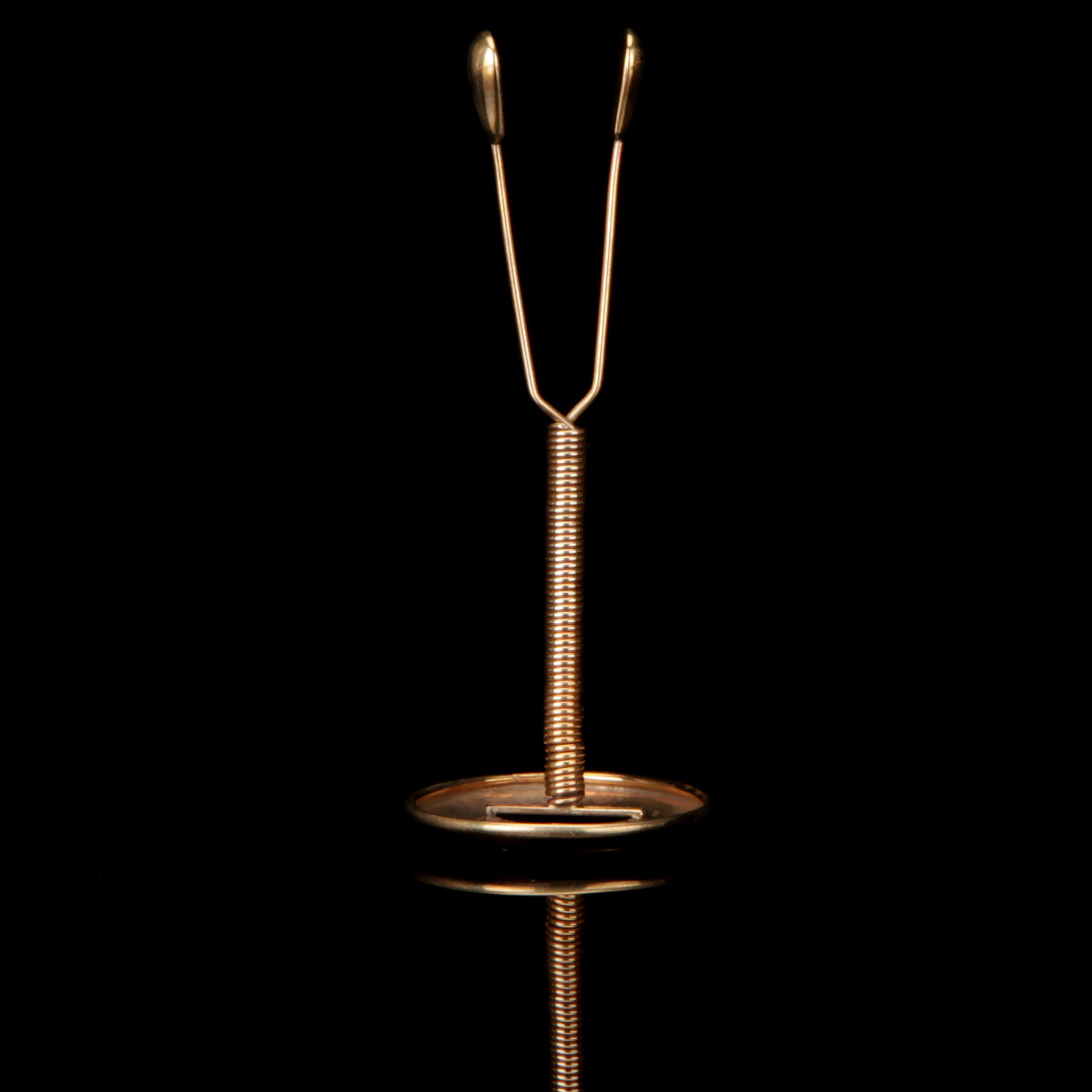 An Early Gold-plated Contraceptive Coil, intra uterine device circa ...