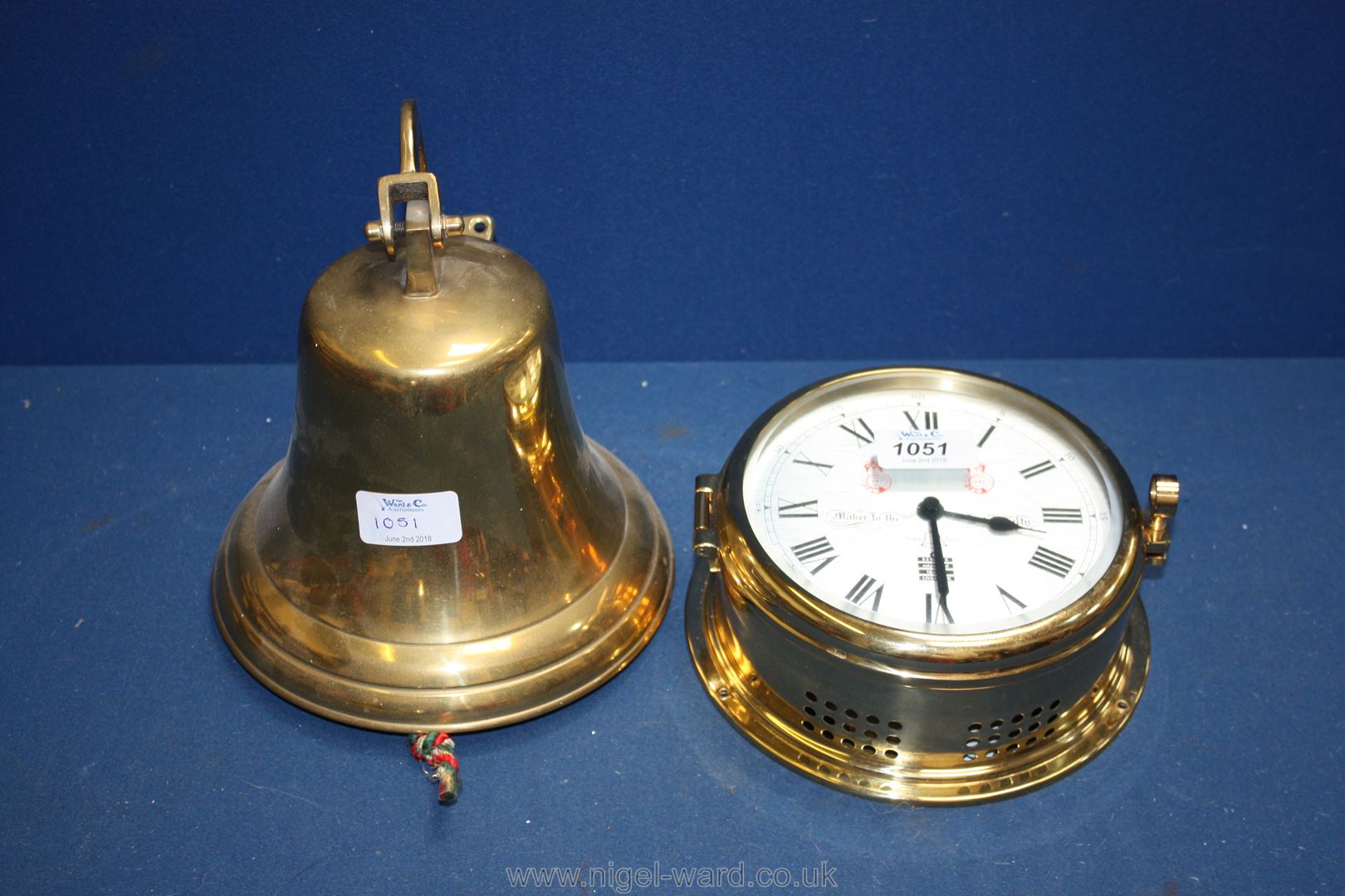 A Ship's Bell strike Clock by Sewills of Liverpool, maker to the ...