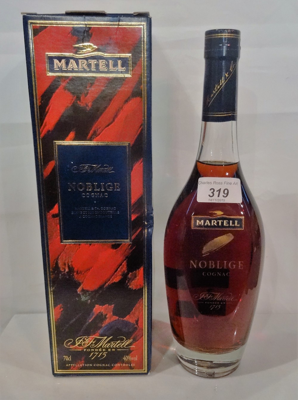 A boxed bottle of Martell Noblige Cognac, 70cl (40% volume).