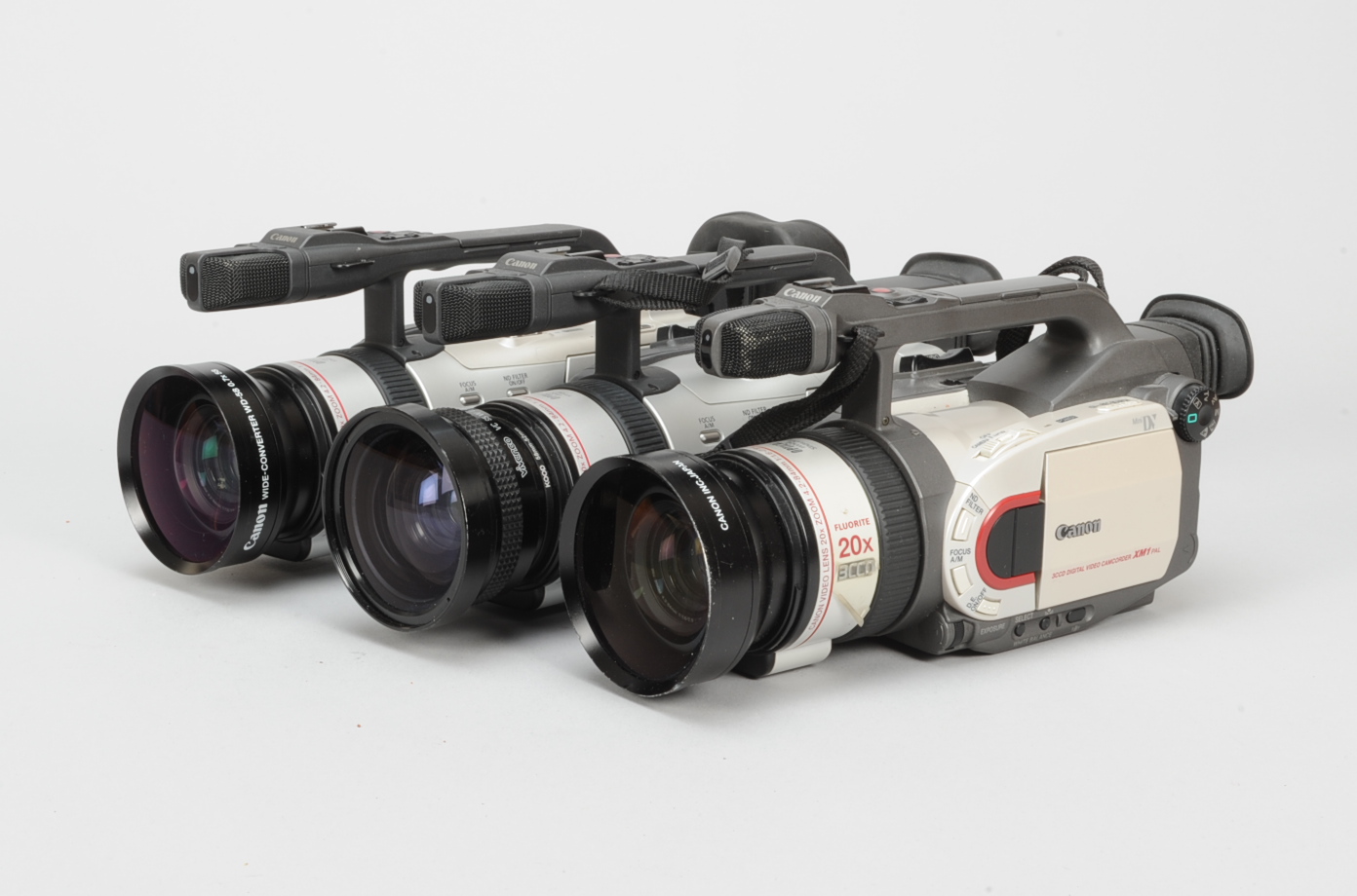 Three Canon 3CCD Digital Video Camcorders, one XM1, with 4.2-84mm f/1.6 ...