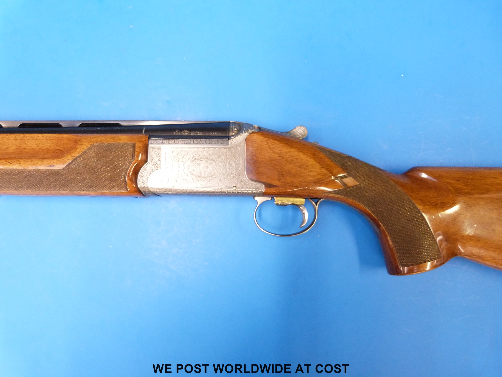 Nikko 2500 12 bore over and under shotgun with floral and scrolling ...