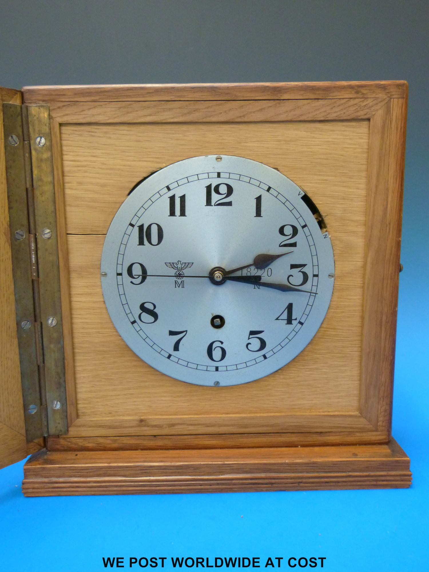 A WW2 Nazi German U-boat bulkhead clock in period oak case as used on ...