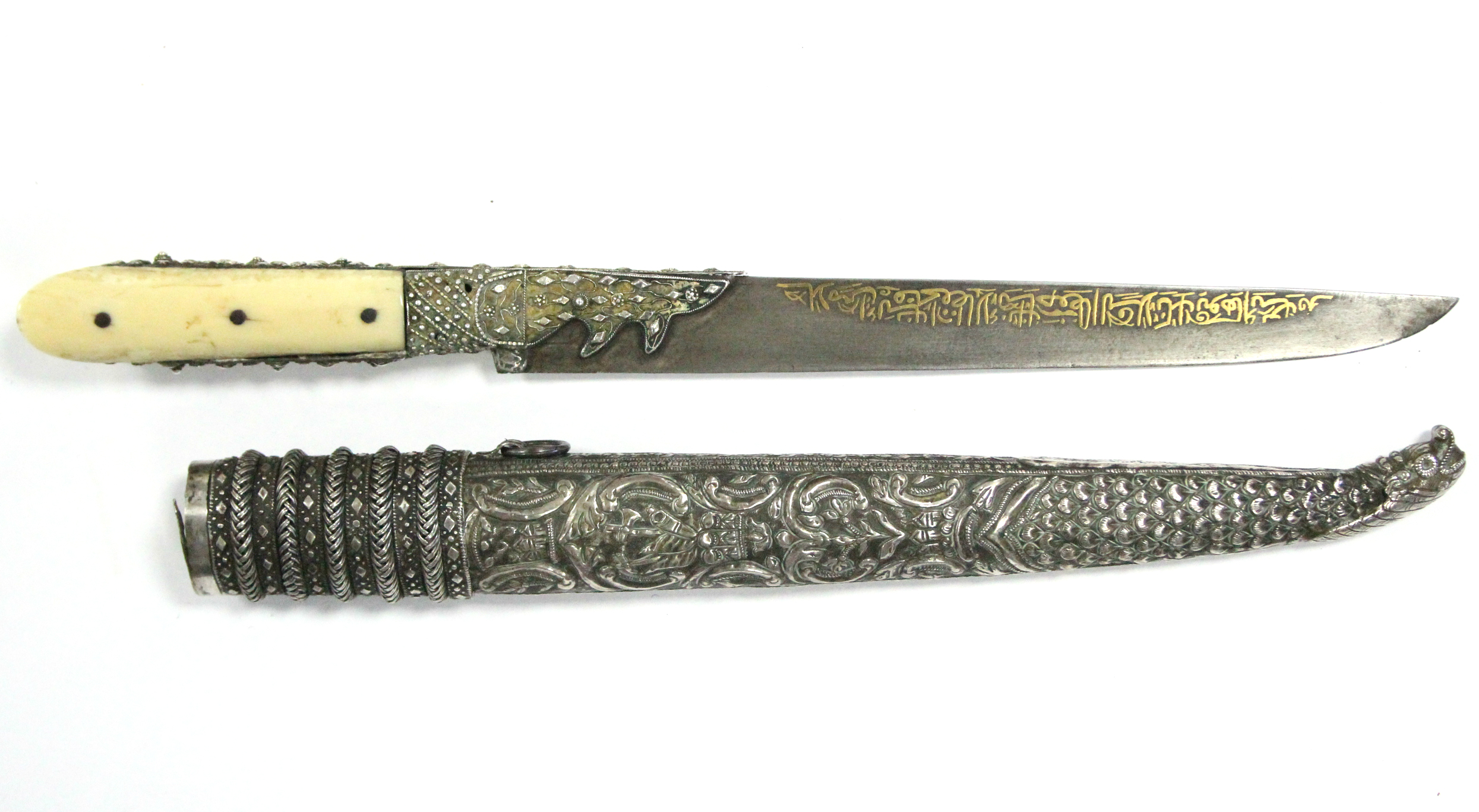 A PERSIAN CEREMONIAL DAGGER, the steel blade with gilt inscription ...