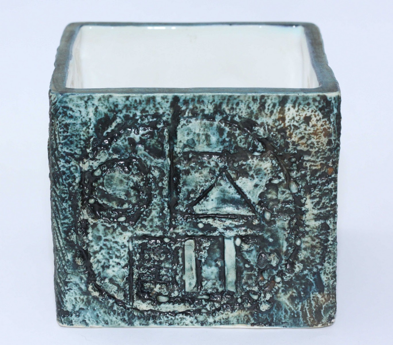 A Troika pottery square vase, the sides decorated with etched abstract ...