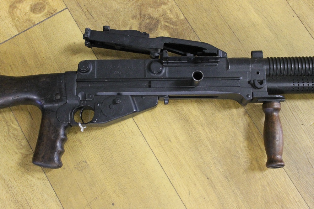 A DEACTIVATED HOTCHKISS MOD 1926 LIGHT MACHINE GUN, with various ...