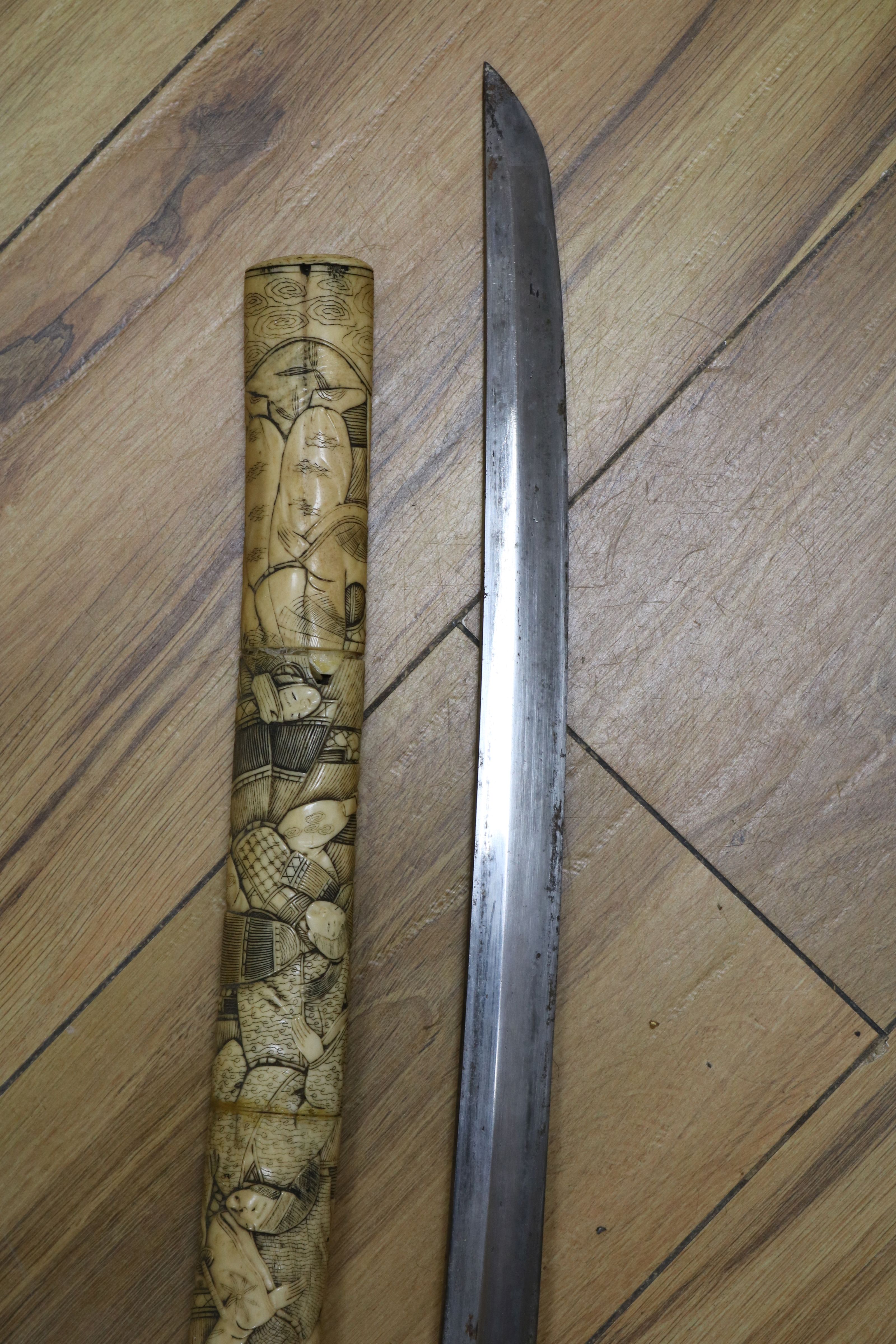 A Japanese carved bone katana short sword length 82cm