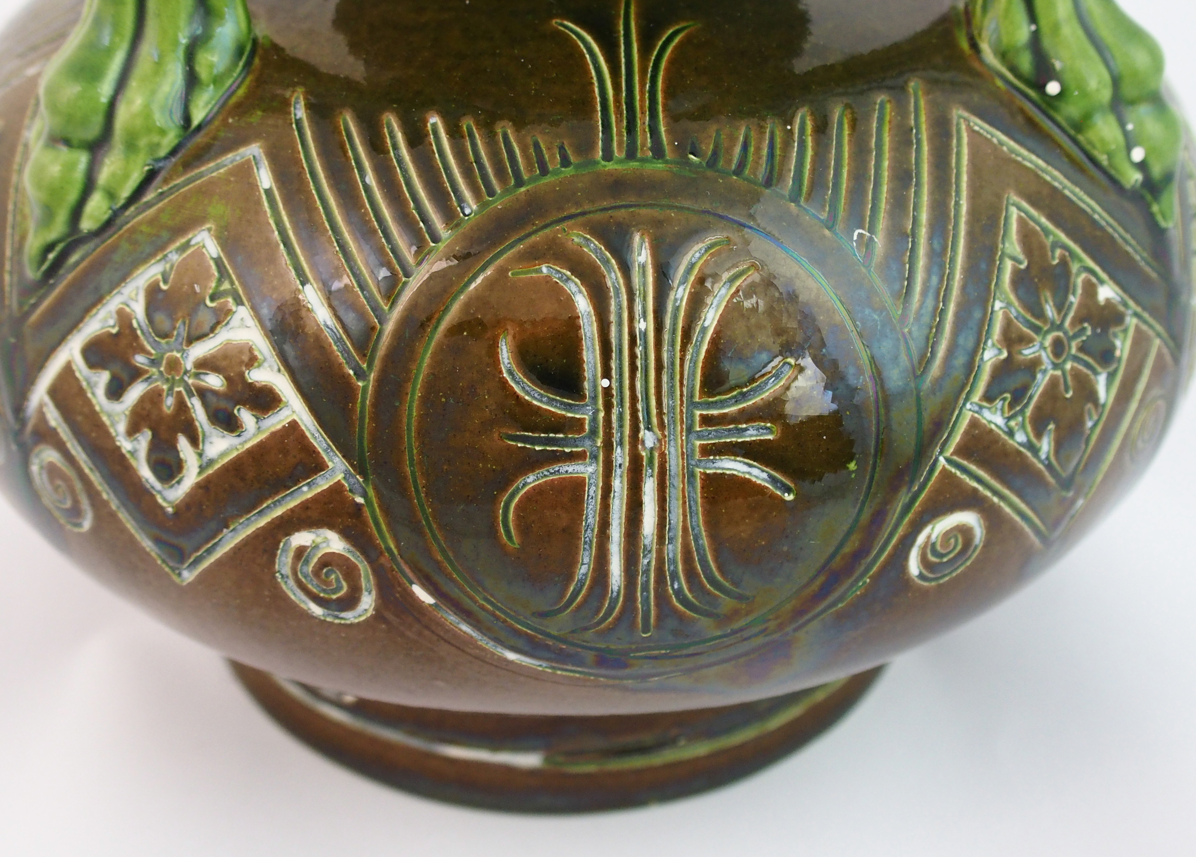 A rare Christopher Dresser "Goats Head" pottery vase designed for ...