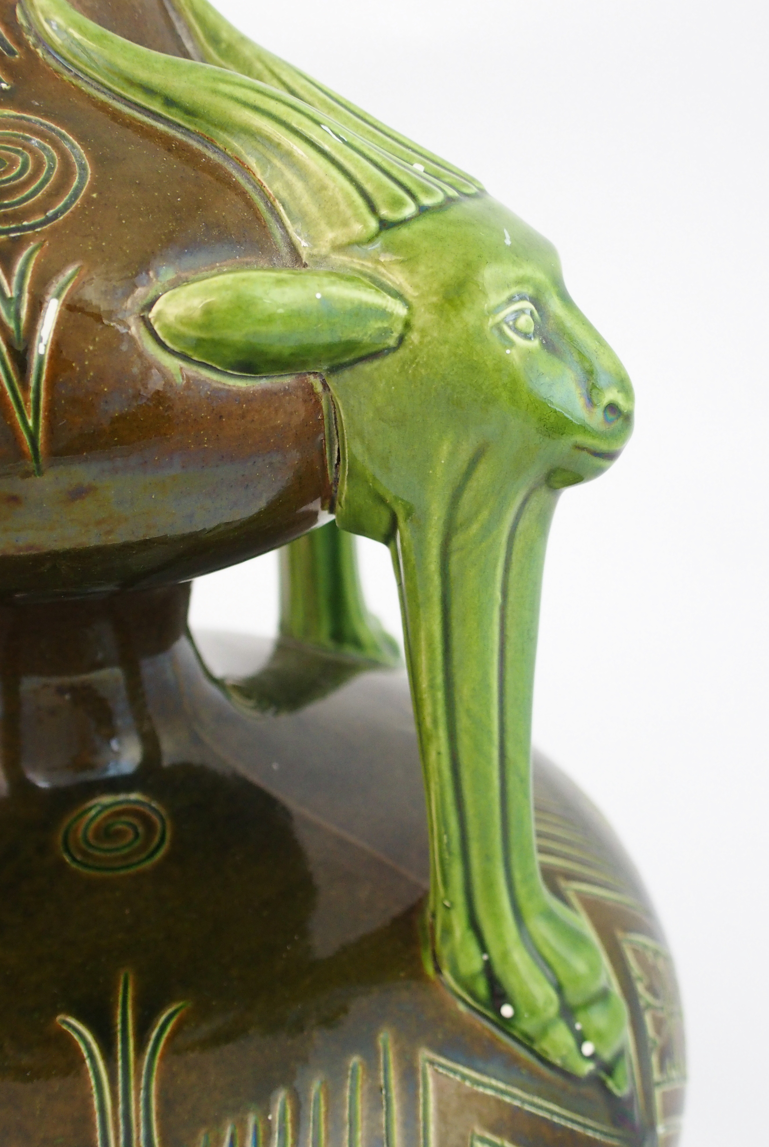 A rare Christopher Dresser "Goats Head" pottery vase designed for ...