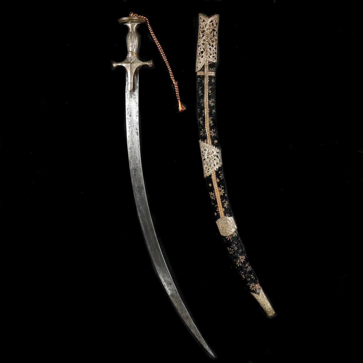 A decorative Indian sword tulwar. 2nd half of the 20th century, curved ...
