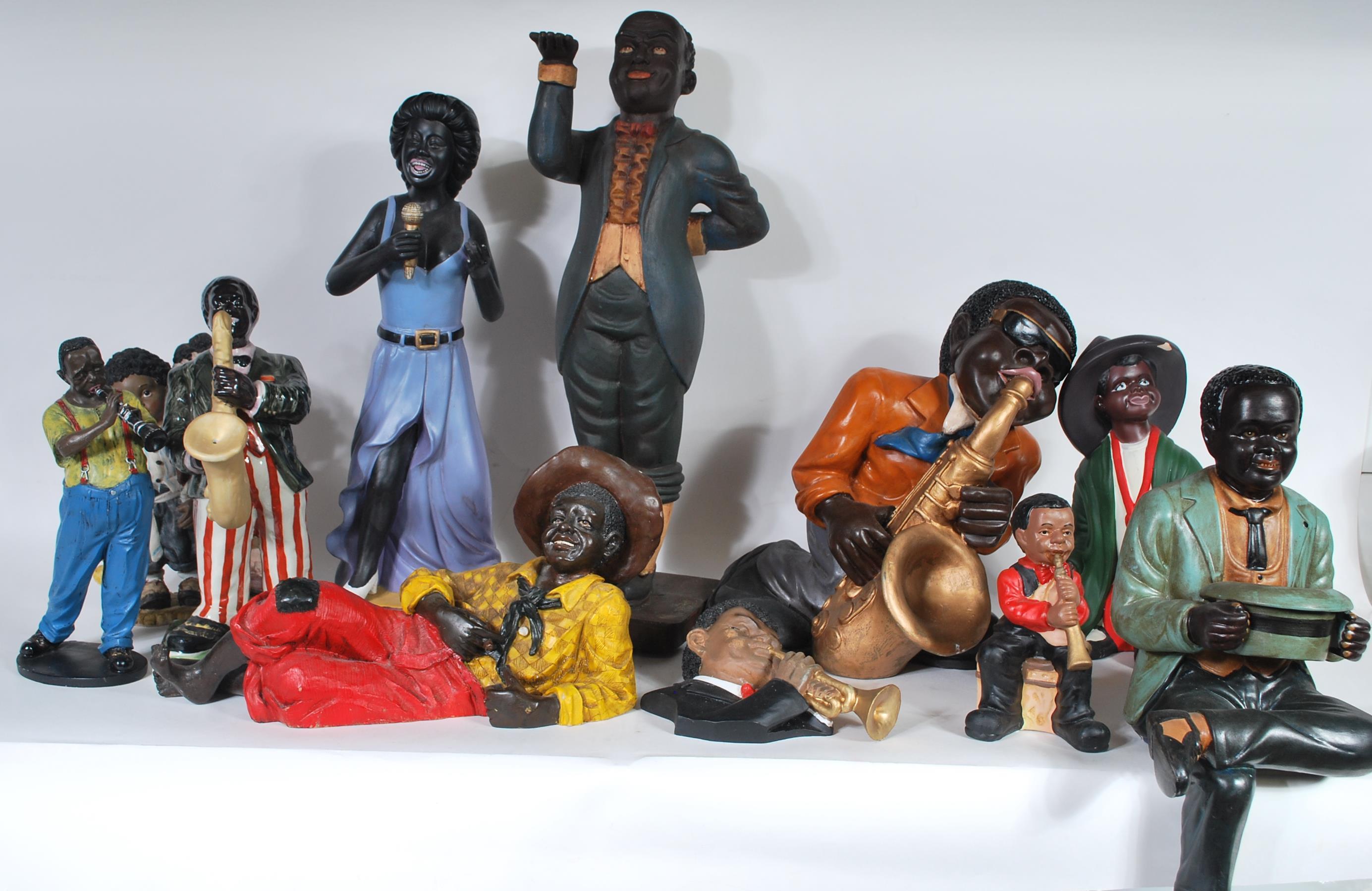 A collection of composite figures of negro jazz musicians to include ...