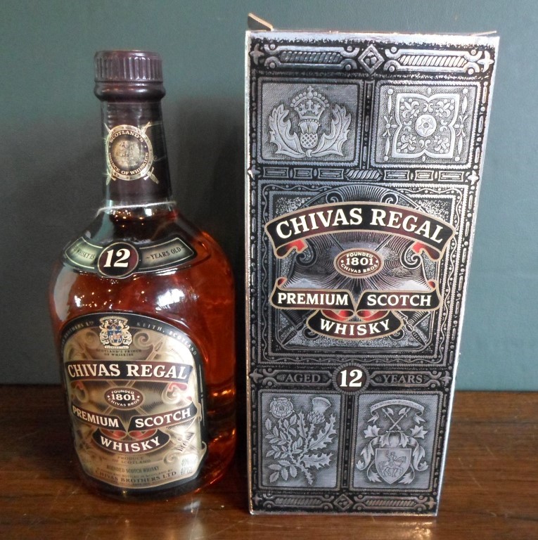 A bottle of Chivas Regal Premium Scotch Whisky, aged 12 years, bottled ...