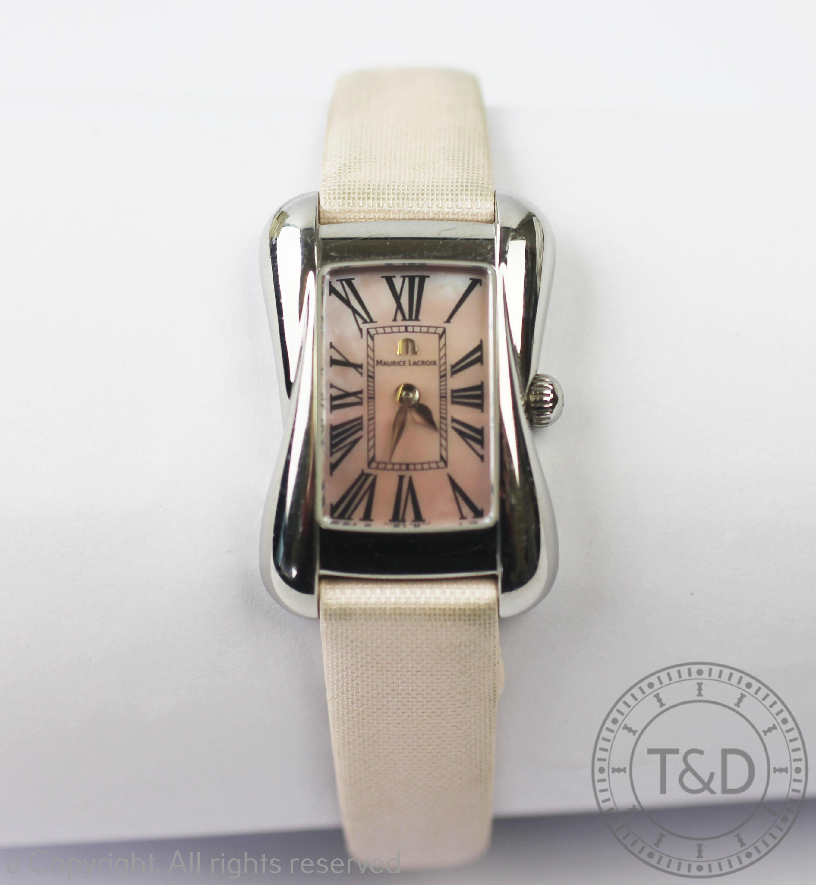 A Maurice LaCroix ladies wristwatch, the shaped rectangular stainless ...