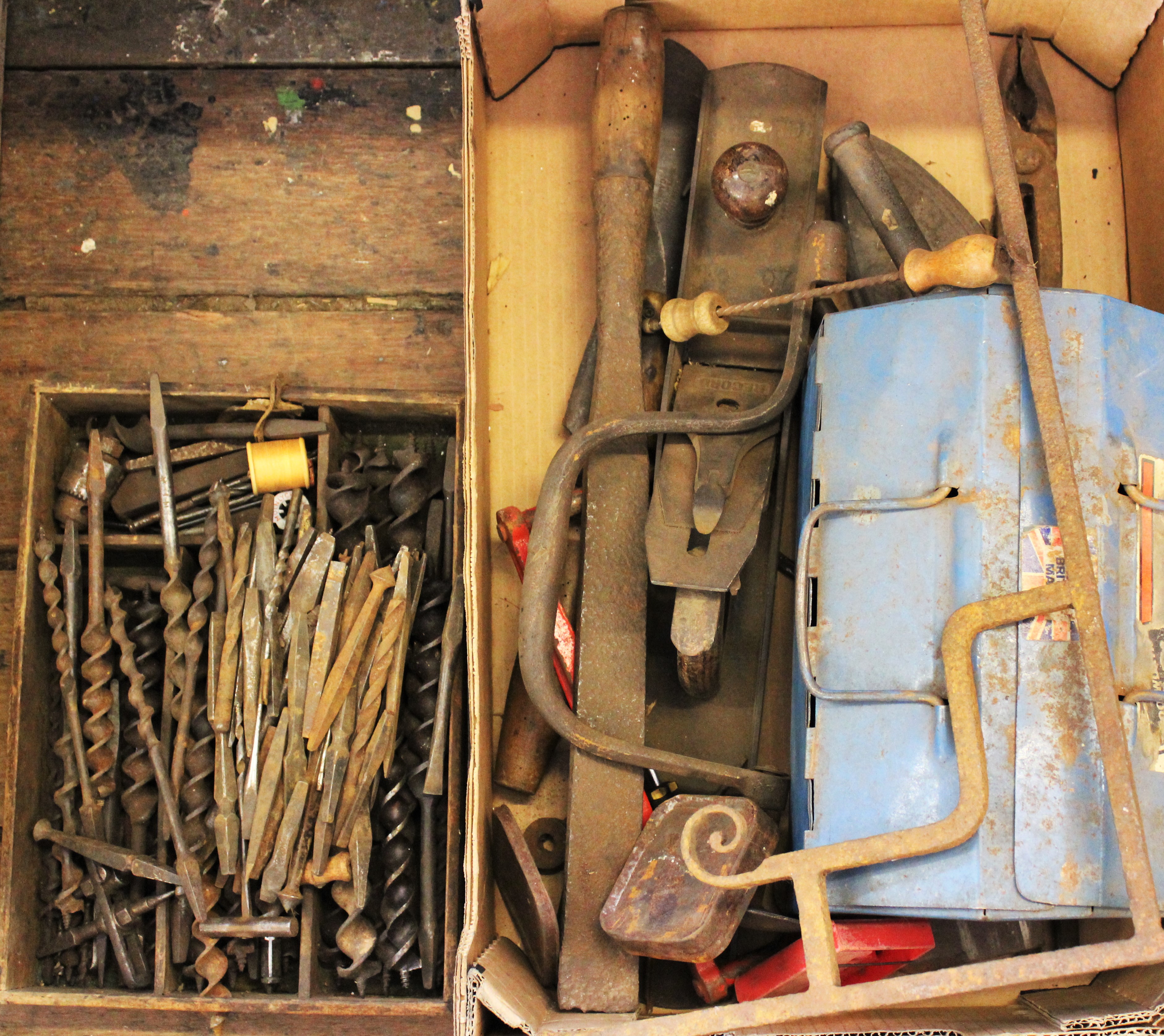A selection of 19th century and later vintage hand tools and farming ...