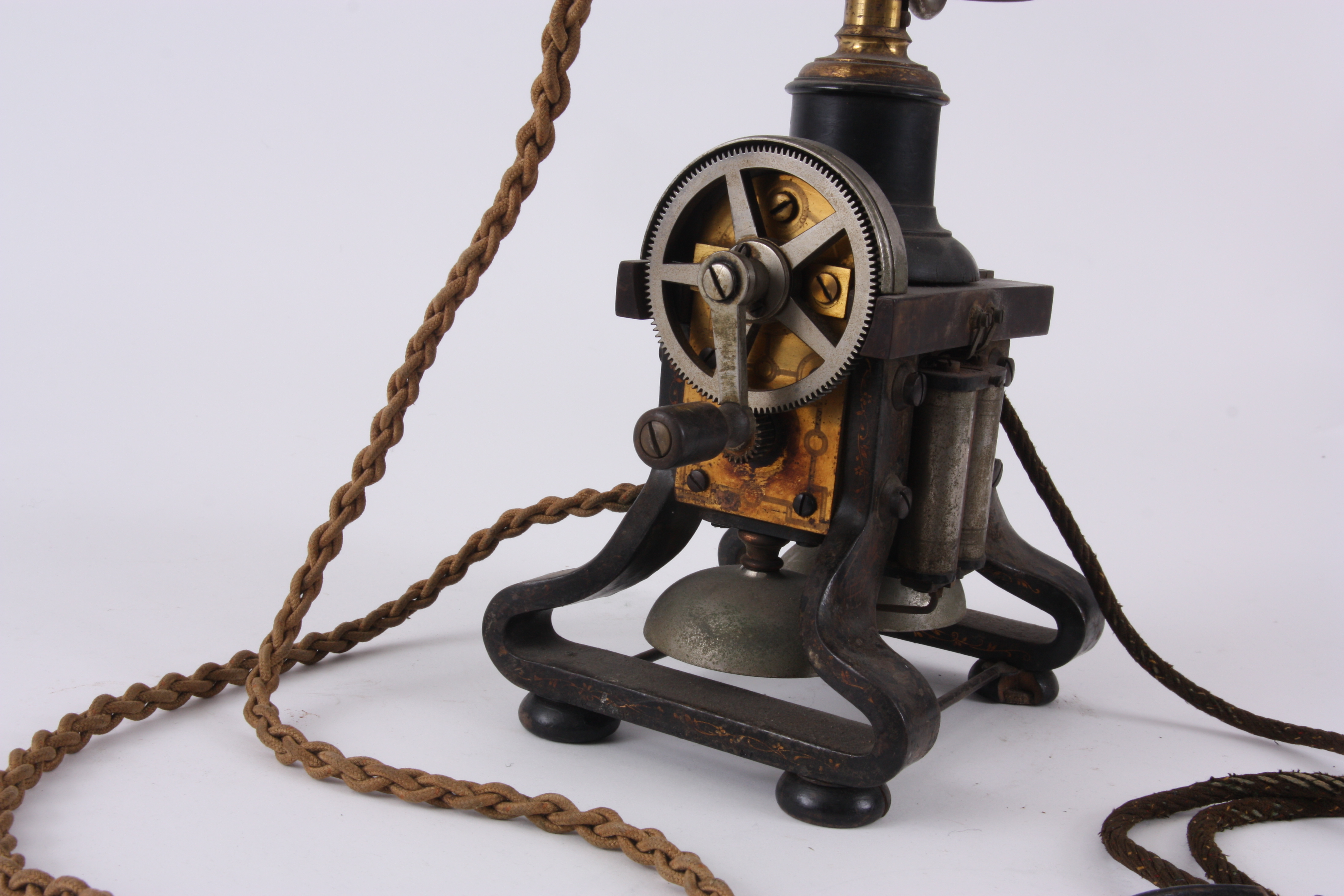 A LATE 19TH CENTURY ERICSSON SKELETON TELEPHONE WITH TEAR-DROP CRADLE ...