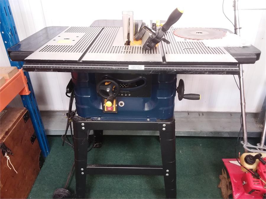 A Macallister 1500w 250mm table saw with laser.