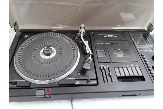 A Bush Audio System-1000 with record deck, tape recorder and radio.