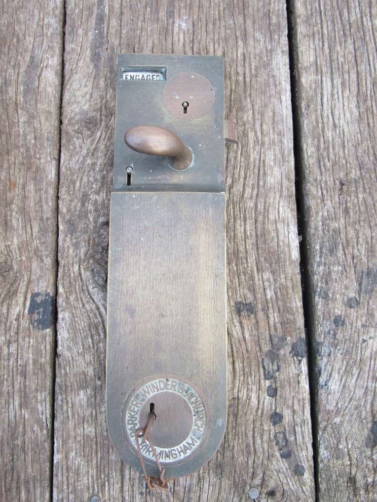 A brass penny in the slot public toilet door lock from a railway ...