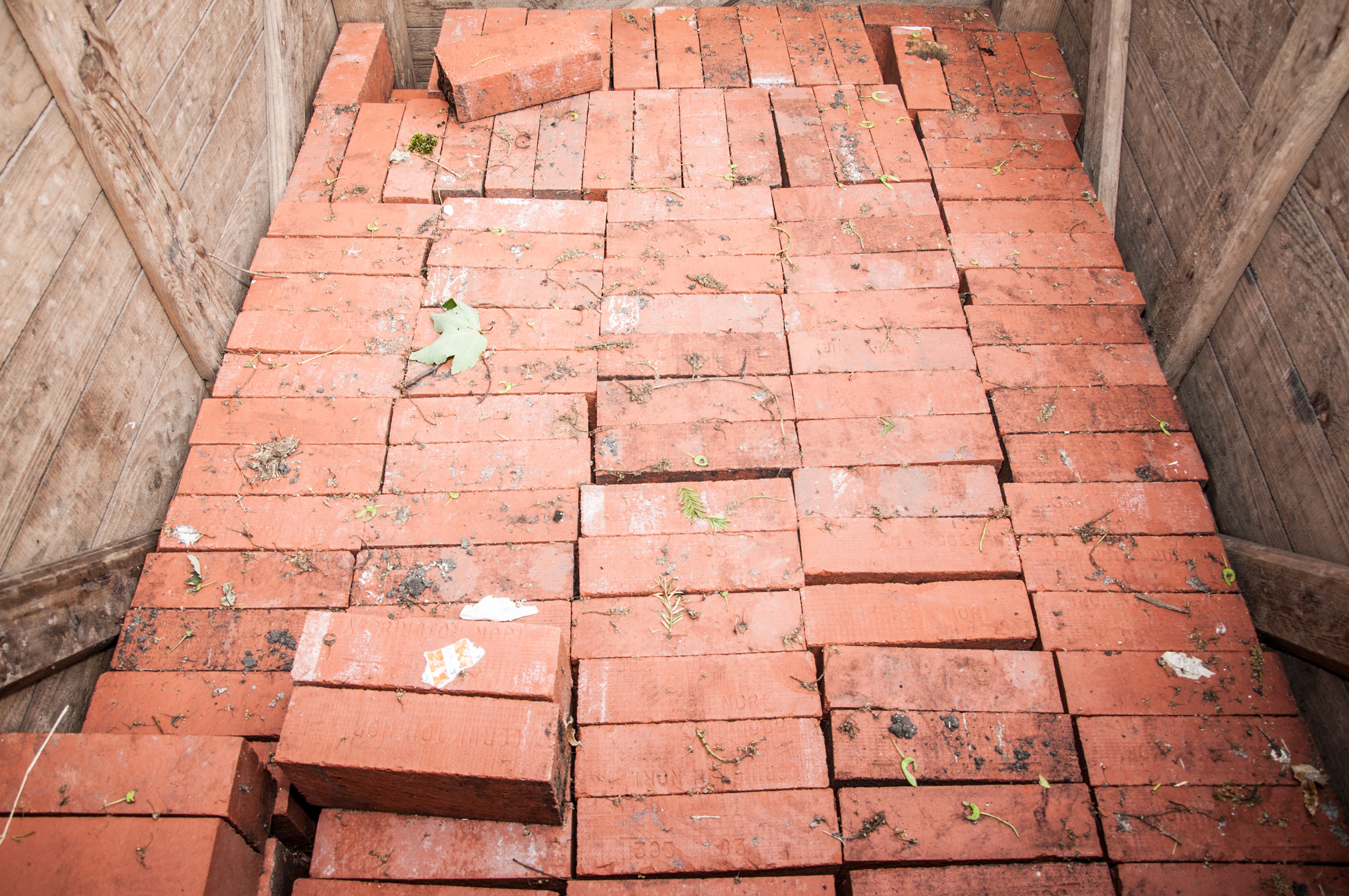 Two wooden crates of Accrington Nori engineering bricks.